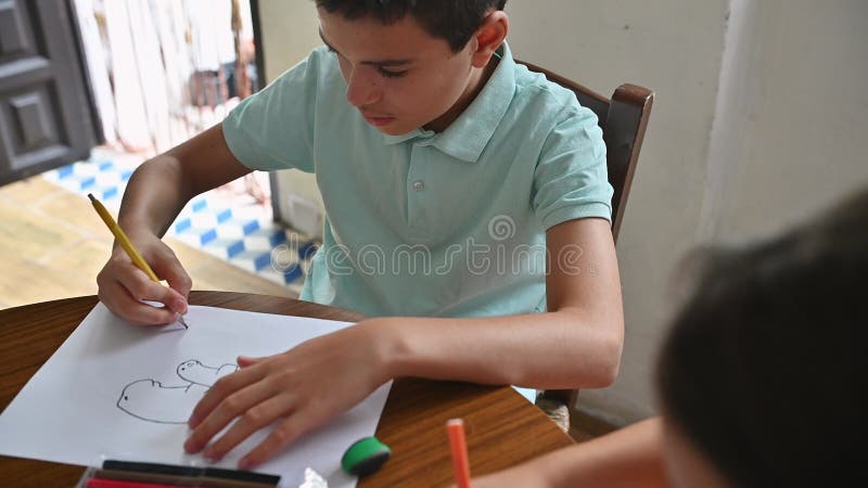 Children Drawing Colorful Artwork with Markers and Pencils during a ...