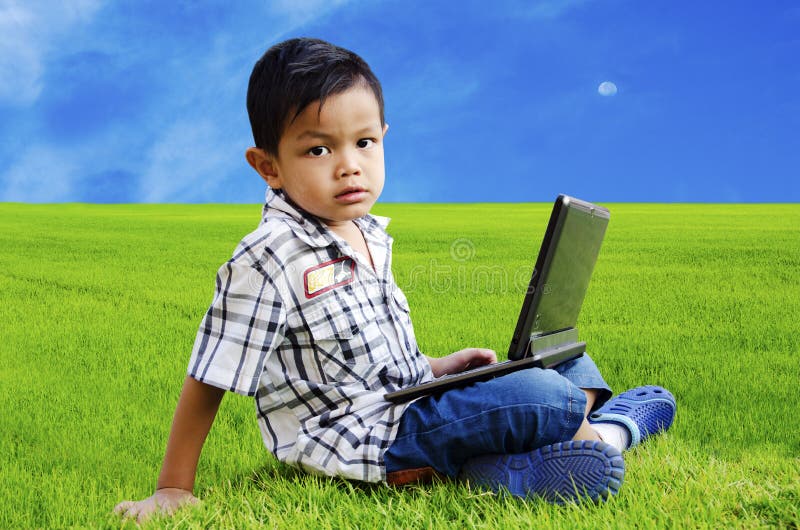 Children are Using the Notebook Stock Image - Image of casual, lawn ...