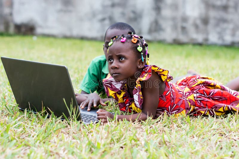 Children Using an Outdoor Laptop Stock Photo - Image of green, african ...