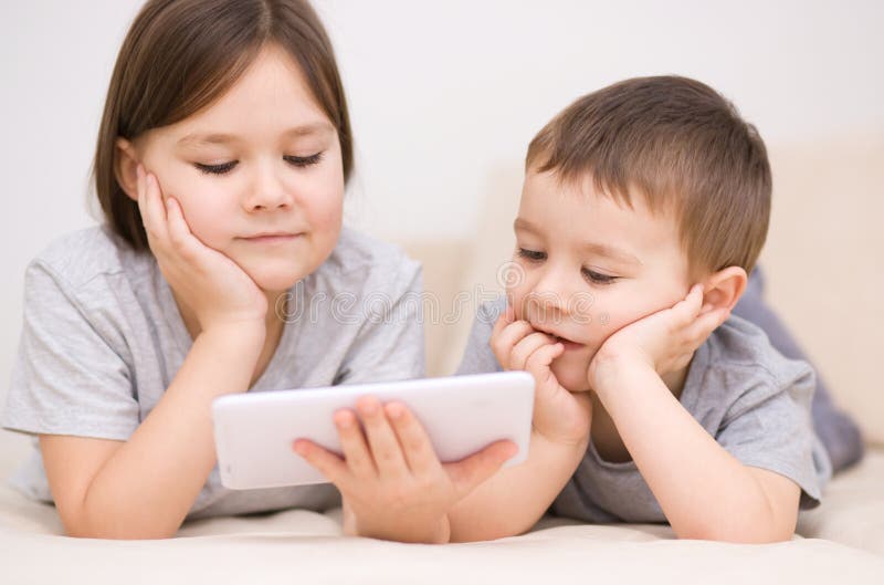 Children Using Tablet Computer Stock Photo - Image of brunette, girl ...