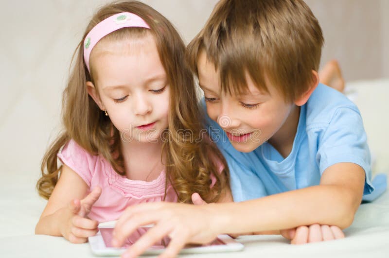Children Using Tablet Computer Stock Photo - Image of friends ...