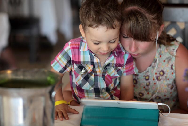 Children using tablet PC stock image. Image of contemporary - 46480431