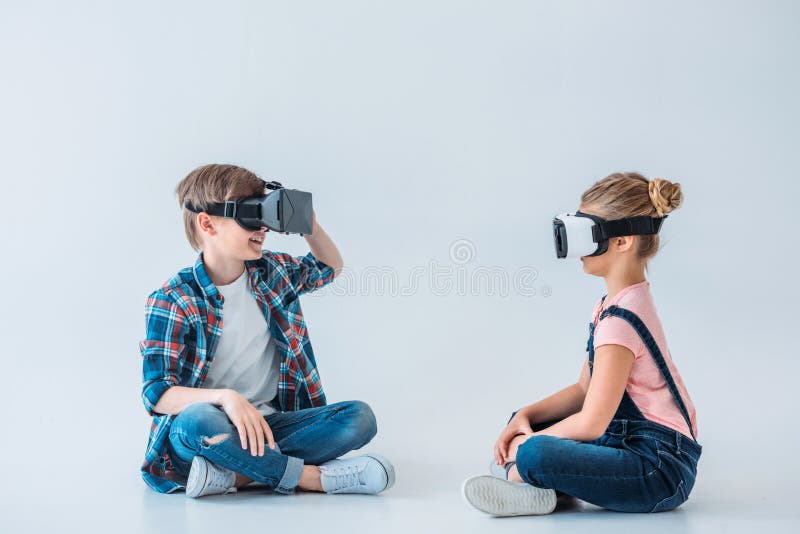 Children Using Virtual Reality Headsets while Sitting on the Floor ...