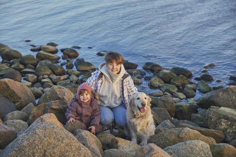 Children Walking with a Dog on the Seashore in the Evening Denmark ...