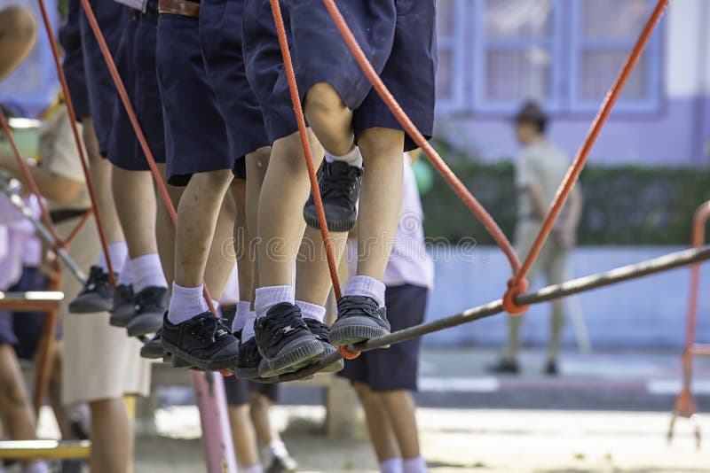 Children Walking On The Wire Rope Are Doing The Activity Stock Photo ...
