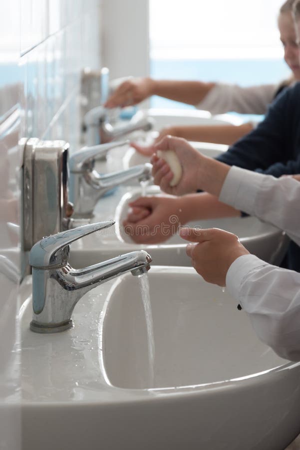 Children Wash Their Hands at School. the Shells are Lined Up in a Row ...