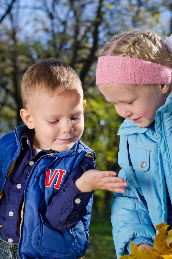 Children Watching an Insect Stock Image - Image of curious, family ...