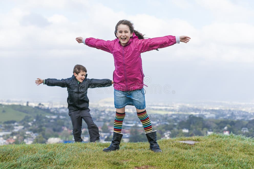 Children in the wind. stock photo. Image of wind, young - 27390560