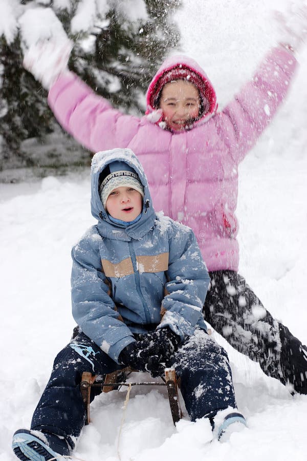 Children Playing in Snow stock image. Image of children - 1867101