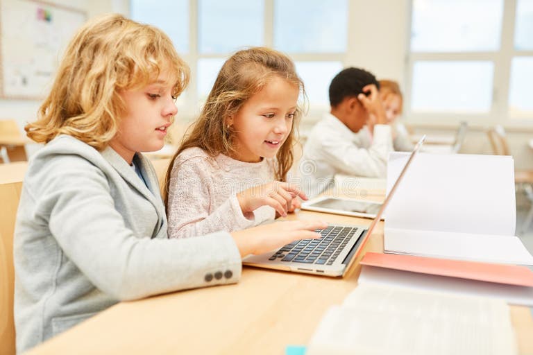 Children Work Together on the Laptop Stock Photo - Image of internet ...