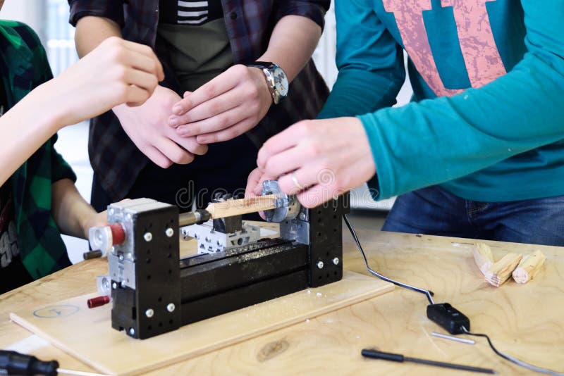 Children Work in the Training Center on Wood Processing Machines ...