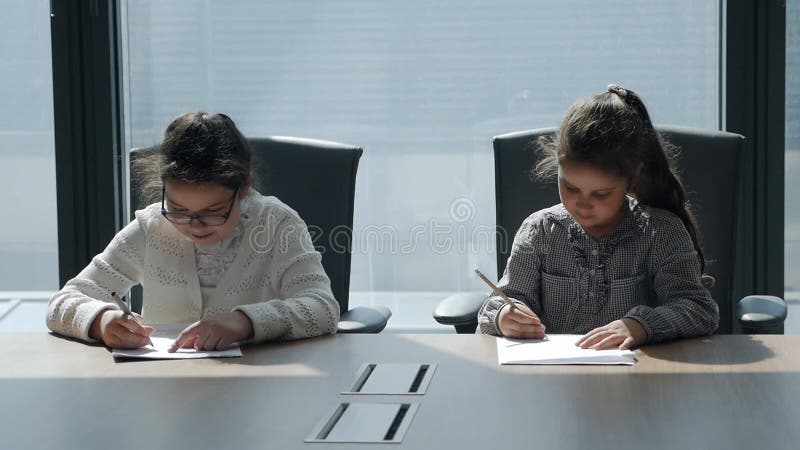 Children Working with Documents in the Workplace, in a Modern Office ...