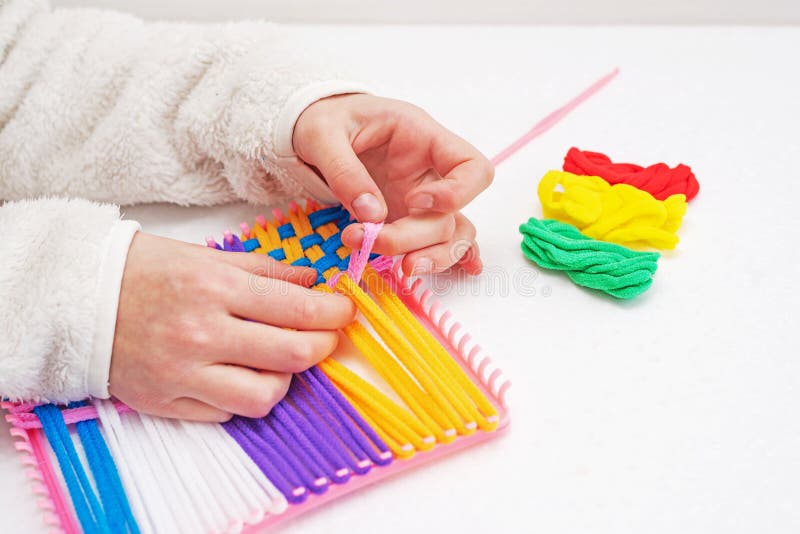 Childrens Creativity Weaving with Colored Threads Ropes Stock Image ...