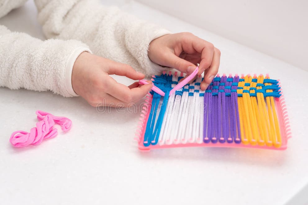 Childrens Creativity Weaving with Colored Threads Ropes Stock Photo ...