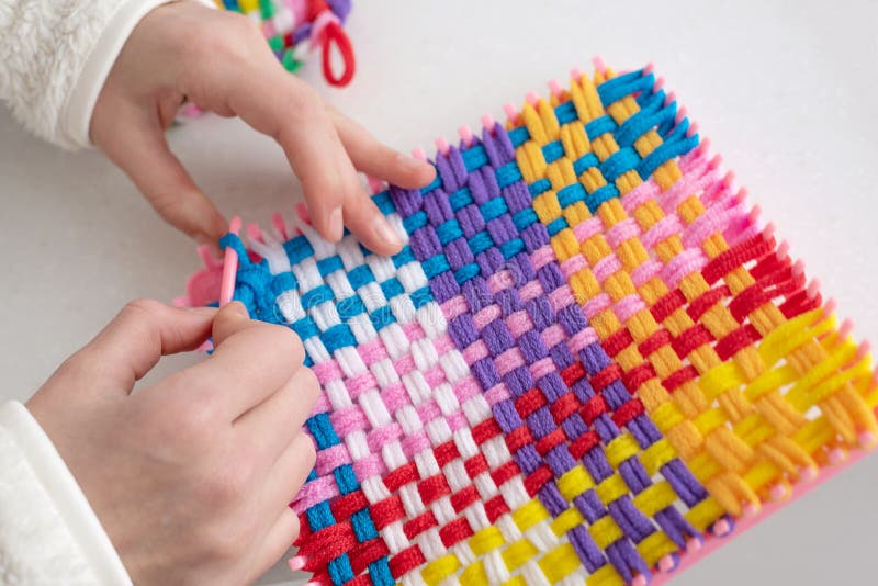Childrens Creativity Weaving with Colored Threads Ropes Stock Image ...