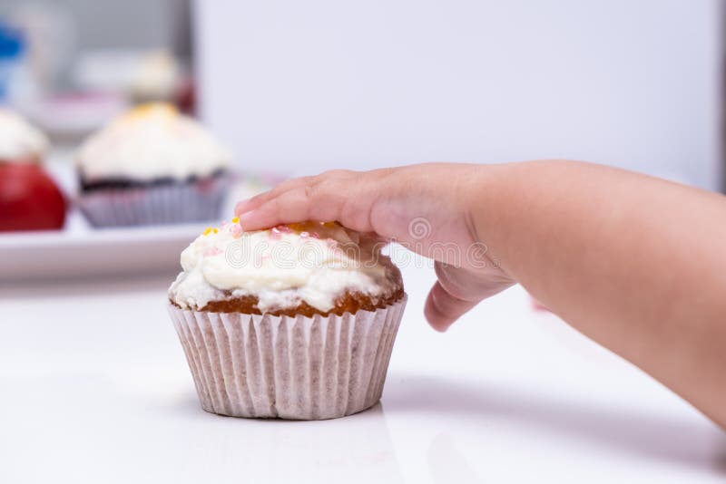 Childrens Hand Reaches for the Cake. Cake Stock Image - Image of ...