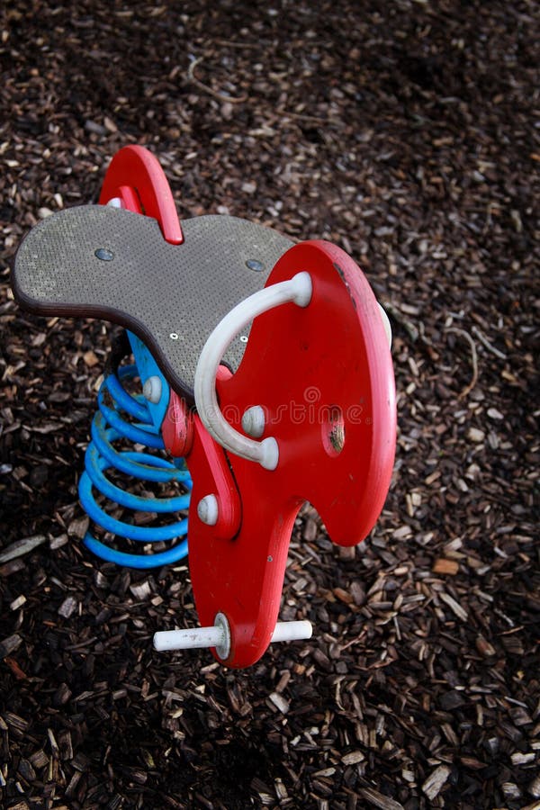 Childrens Spring Rocking Ride in a Play Park Standing Empty Stock Image ...