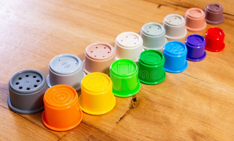 Childrens Toy Plastic Cup Pyramid Made of Multicolored Elements Stock ...