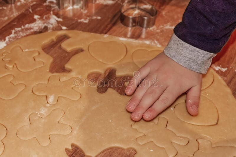 A Childs Hand on a Cookie Dough Stock Photo - Image of holiday, sweet ...