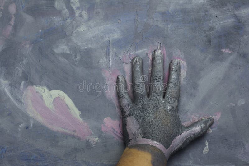 Childs Painted Hand Over a Painted Wood Surface Stock Image - Image of ...