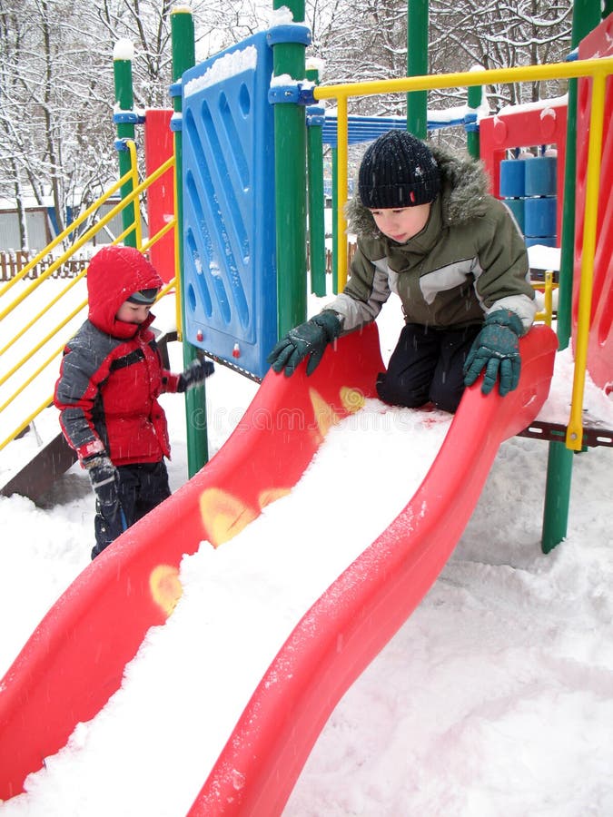 Childs on playground stock image. Image of outdoors, cold - 13674203