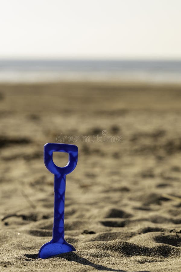A Childs Spade on a Cornish Beach Stock Photo - Image of sand, relaxing ...