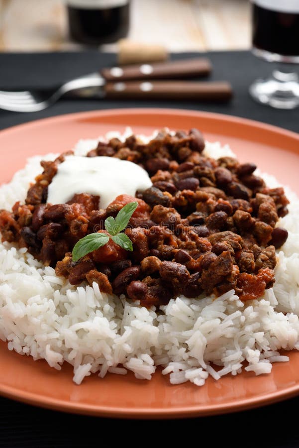 Chili con carne and rice stock image. Image of beef, dinner - 58673455