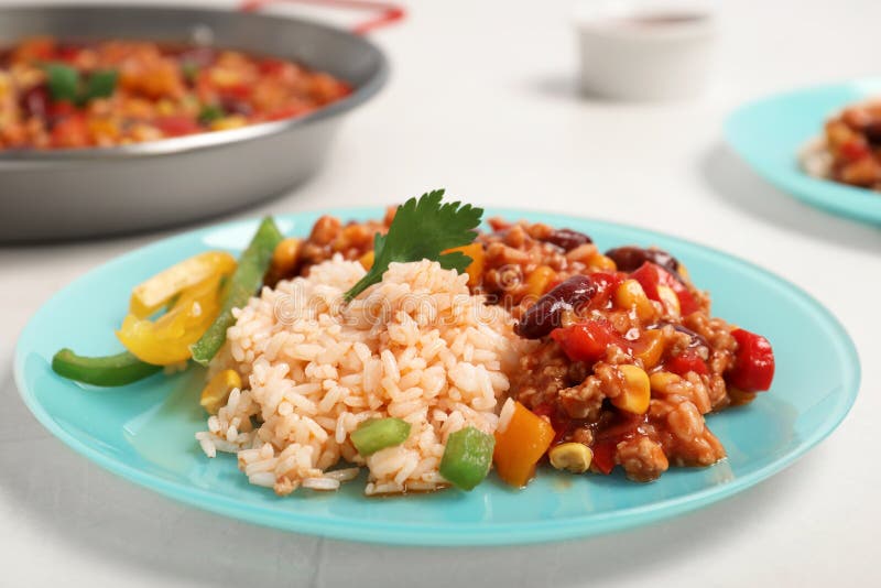 Chili Con Carne Served with Rice Stock Photo - Image of dinner, pepper ...