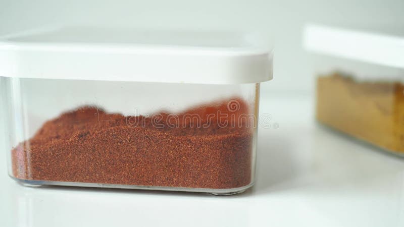 Chili Flakes in a Box on White Background Stock Footage - Video of ...
