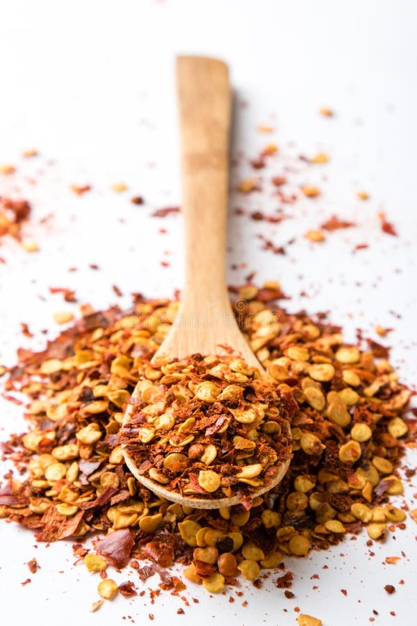 Chili Flakes on White Table Stock Image - Image of chili, food: 70335137