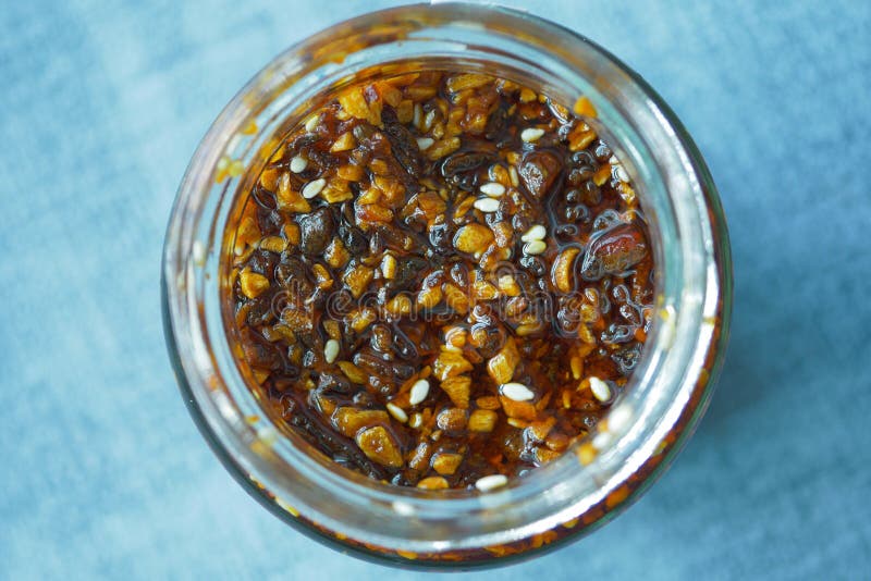 Chili and Garlic Flakes in a Container Stock Image - Image of spoon ...