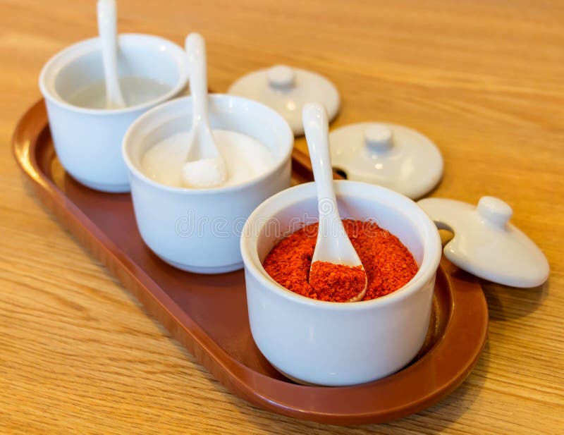 Chili powder in white cup stock photo. Image of sugar - 84451318