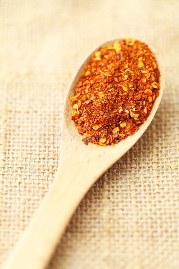 Chili Powder on Wooden Spoon Stock Image - Image of chili, cumin: 29985539