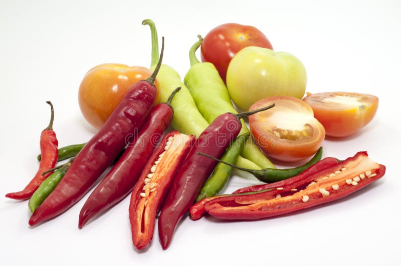 The CHILI and TOMATO in FOCUS. Stock Image - Image of ripe, isolated ...