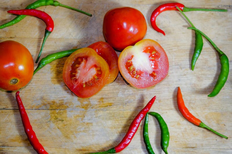 Chili and tomato stock image. Image of yummy, wood, candy - 96034205