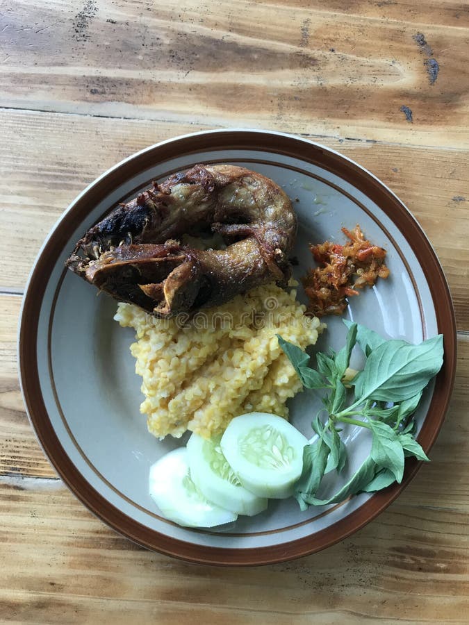 Yellow rice stock photo. Image of cooked, cooking, dish - 258090824