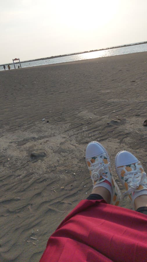 Chill at the beach stock image. Image of ocean, person - 208793125