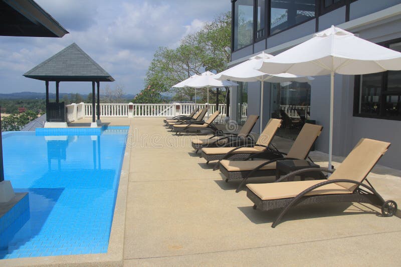 Chill out stock image. Image of resort, pool, next, bench - 88965937