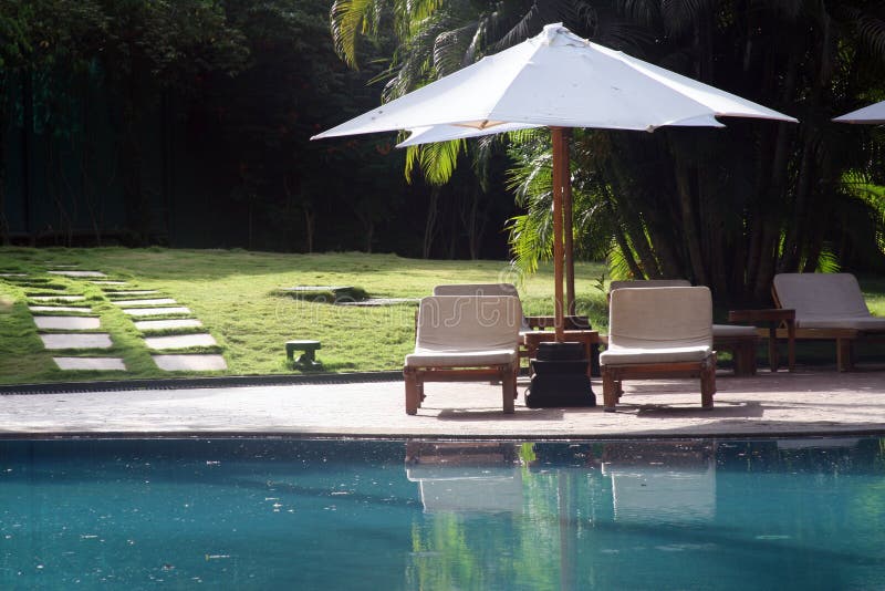 Chill Out By The Pool -Getaway Stock Photo - Image of chaise, getaway ...