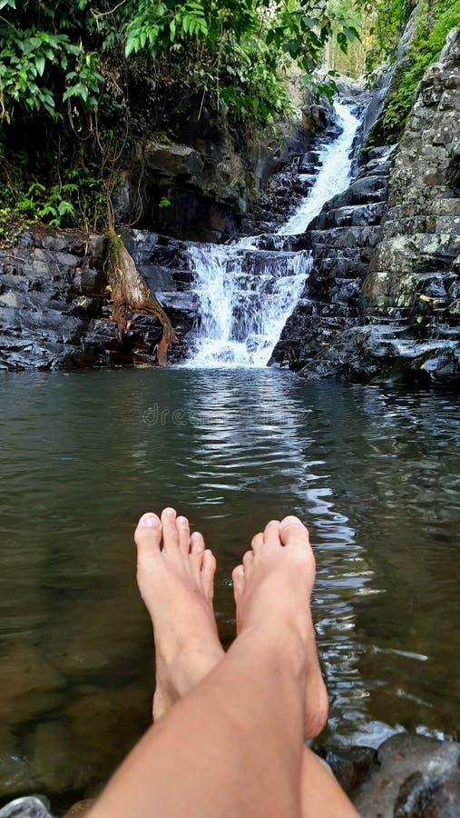 Chill at the waterfall stock photo. Image of stream - 263433668
