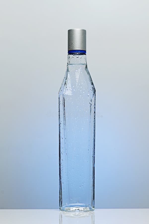 Chilled Vodka Cocktail Drinks with Spices on Rustic Wooden Board Over ...