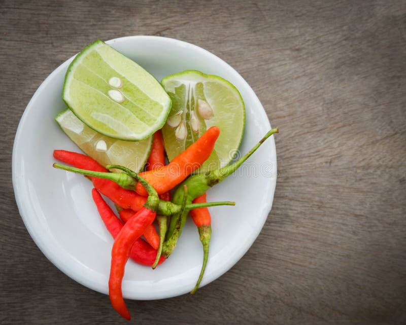 Chilli and lemon baskets stock photo. Image of exotic - 12192452