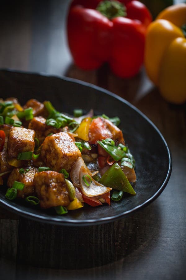 Chilli Paneer Served in a Black Plate Stock Photo - Image of served ...