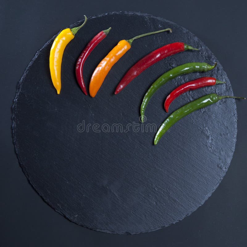 The Chilli Pepper on Black Stone Stock Photo - Image of still, chilli ...
