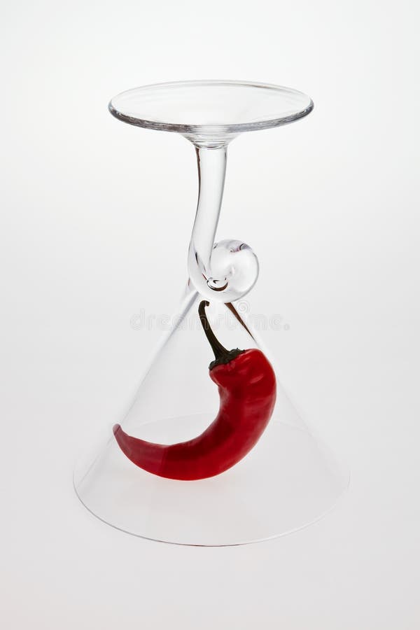 A Chilli Pepper Under Wine Glass Stock Image - Image of seasoning, heat ...