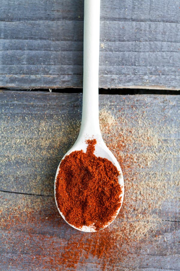 Chilli powder on spoon stock photo. Image of herb, culinary - 42916398