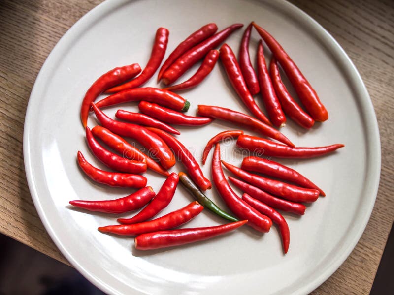 Chilli Red on White Ceramic Plate Stock Photo - Image of organic ...