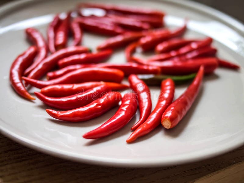 Chilli Red on White Ceramic Plate Stock Image - Image of food, color ...