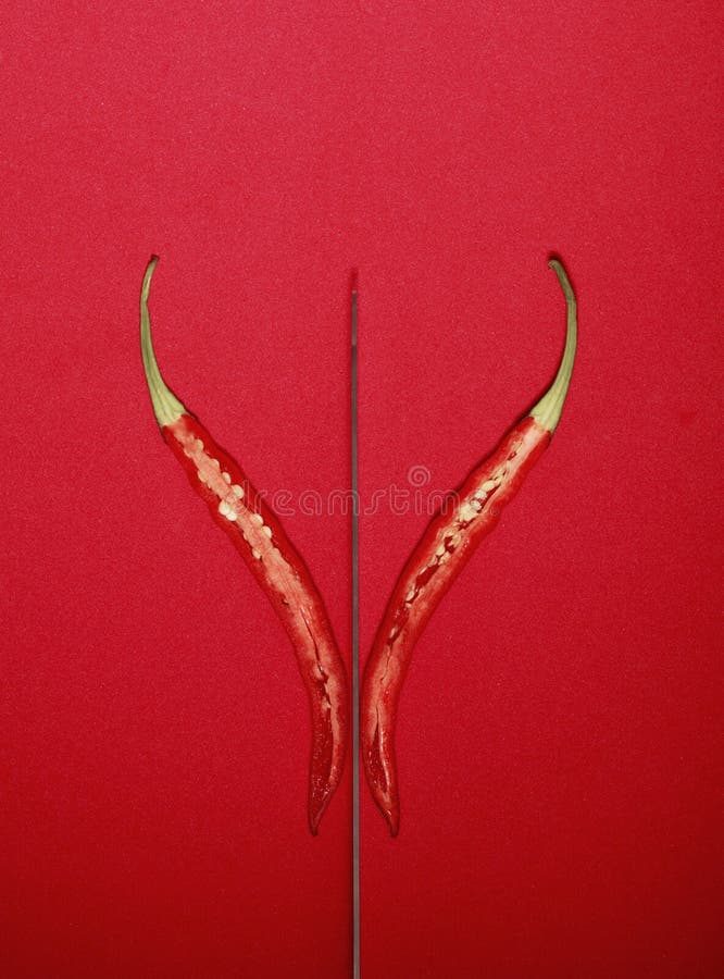 Chilli sliced into half stock photo. Image of flavour - 186458506