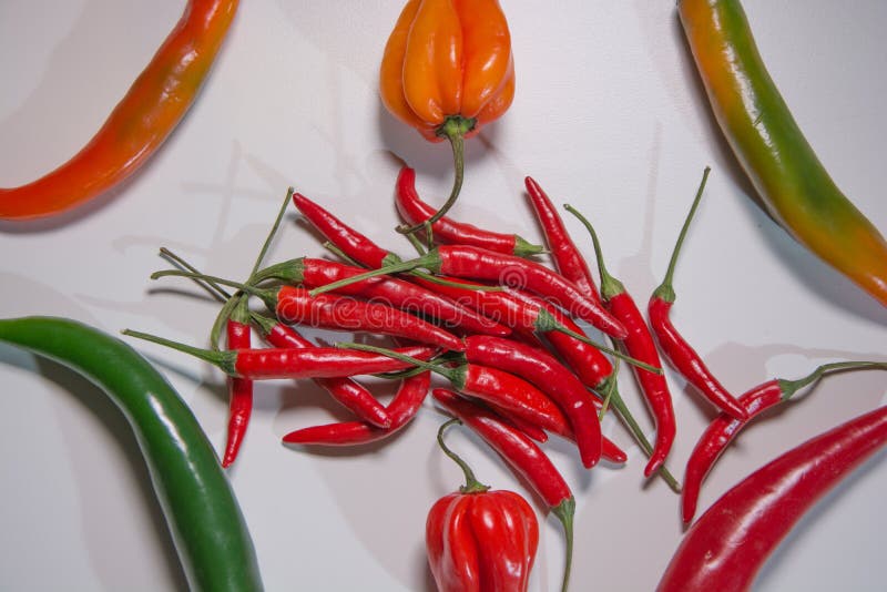Chillies, Different Types and Colors in the Foreground Stock Photo ...